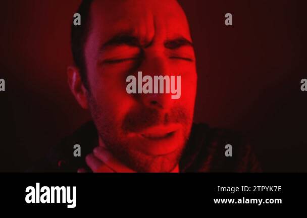 Man is choking on an asthma attack uses inhaler and feels relief Stock ...