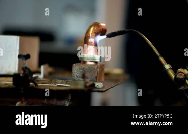 Craftsman soldering copper pipe Stock Videos & Footage - HD and 4K ...