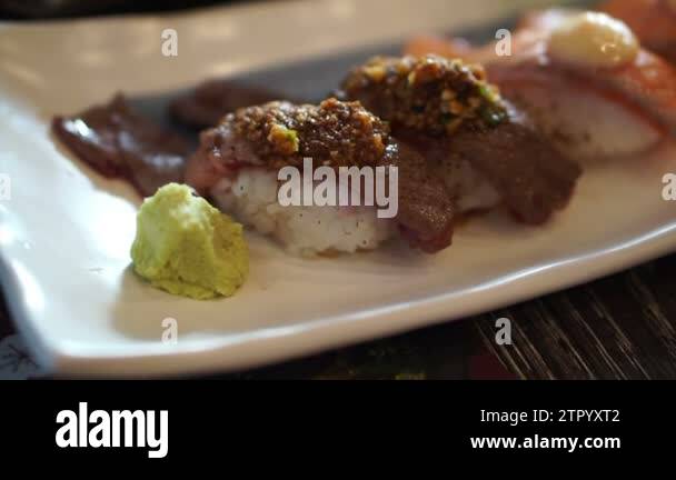Aburi Nigiri, seared beef and salmon sushi Japanese cuisine half cook ...