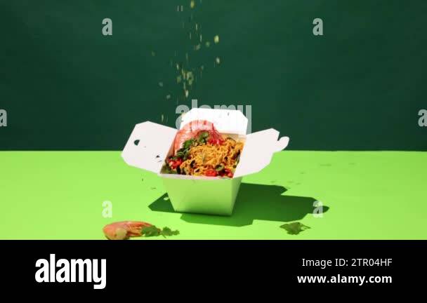 Cilantro falling into delicious udon noodles with shrimp and roasted ...