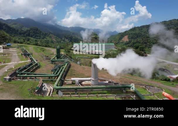 Thermal power plant on a volcano in the middle of the jungle, steam ...