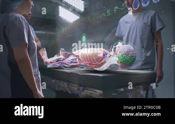 Multiethnic surgical team work in operating room using holographic ...