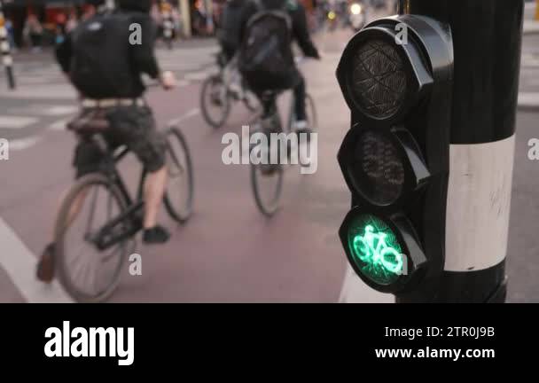 Mad traffic bicyclists on the street in Amsterdam. There are no ...