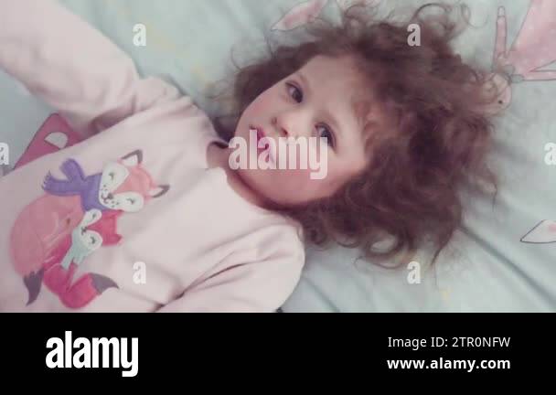 Little girl waking up from her day nap Stock Video Footage - Alamy