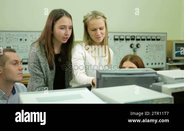Young student engineers team work in the University of the electrical ...