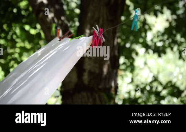 Sheets washing line Stock Videos & Footage - HD and 4K Video Clips - Alamy