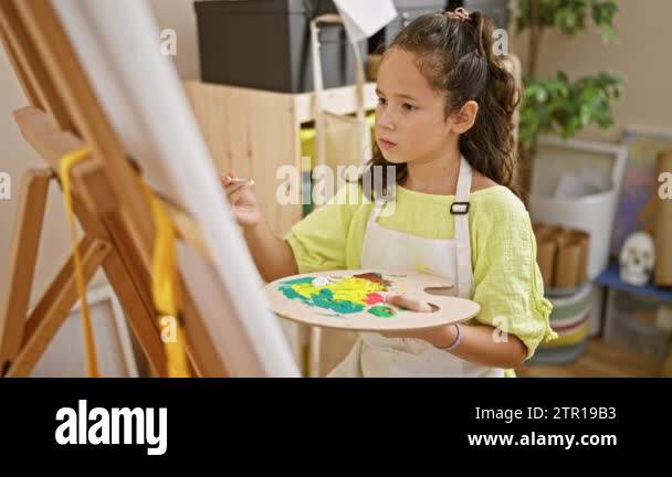 Mother-daughter bonding at the art studio, woman teacher and girl ...