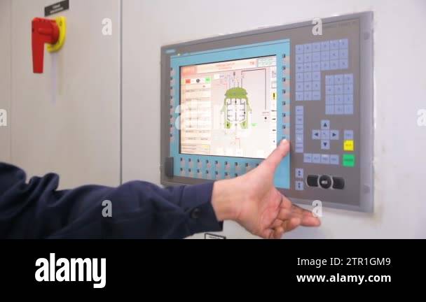 Control cabinets, displays at an electrical substation at power plant ...