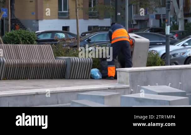 Man removing trash Stock Videos & Footage - HD and 4K Video Clips - Alamy
