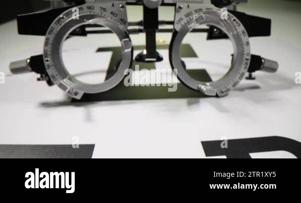 Trial frame test for eye chart and glasses. Ophthalmologist instruments ...