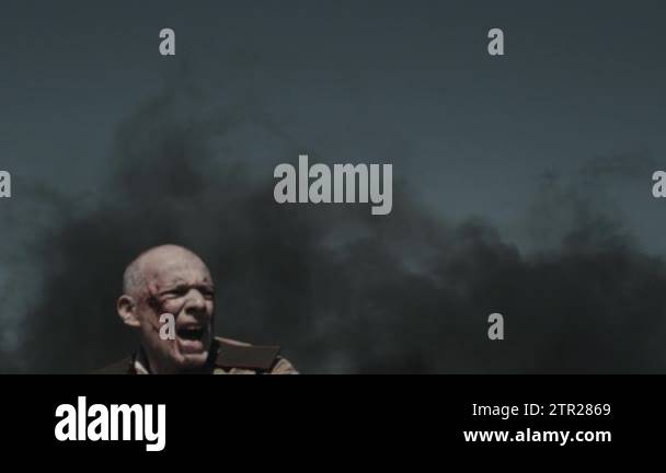 Low angle view portrait of mature Red Army soldier shouting and firing ...