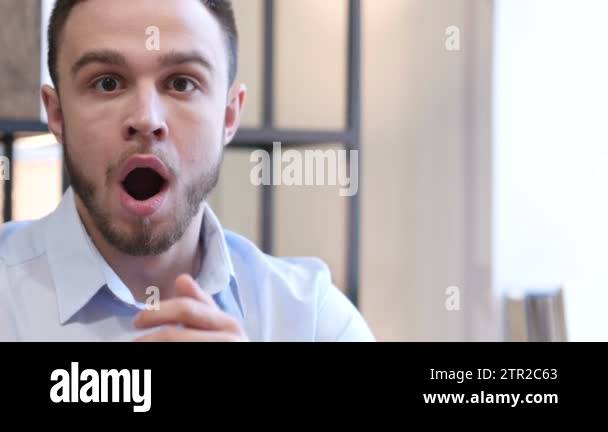 Shocked young man Stock Videos & Footage - HD and 4K Video Clips - Alamy