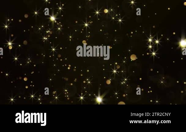 Looping video gold star glow particles background. Bokeh gold ...