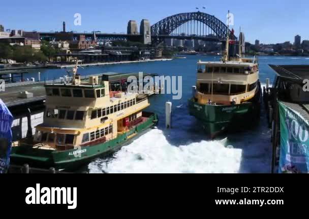 Passengers on board of Sydney Ferries at Circular Quay ferry wharf ...
