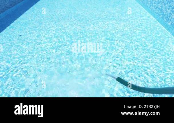 Pool Water Background Loop. 4k, close-up. water flows into the pool ...