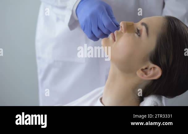 Woman doctor nose Stock Videos & Footage - HD and 4K Video Clips - Alamy