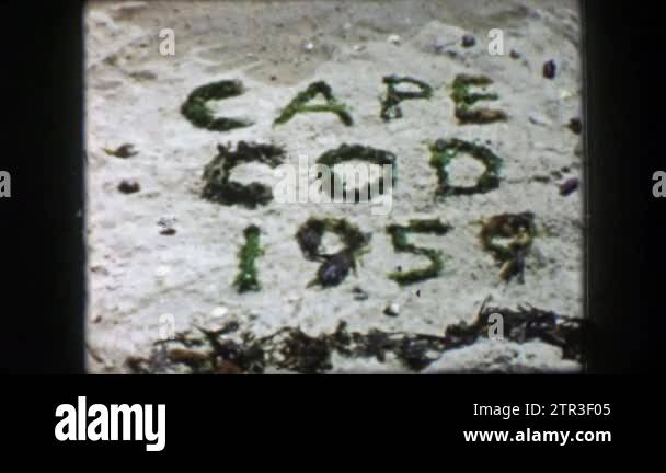 Cape Cod written on beach sand Stock Video Footage - Alamy