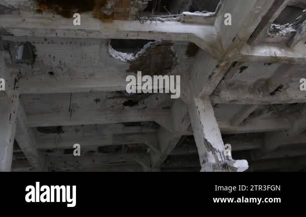 The ruins of an old factory. The abandoned building was covered with ...