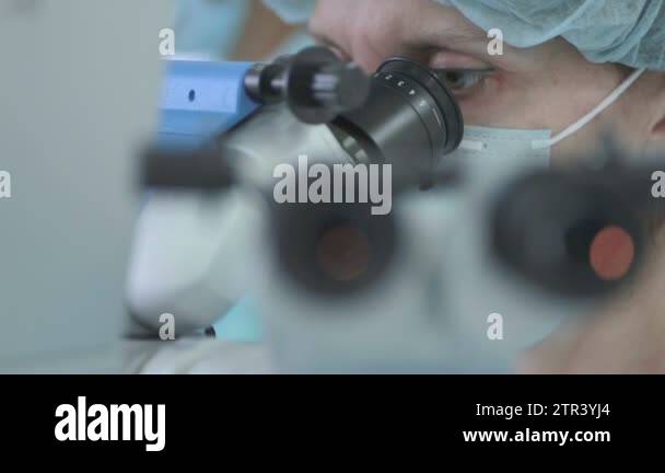 Unrecognizable female researcher working in pharmaceutical industry lab ...