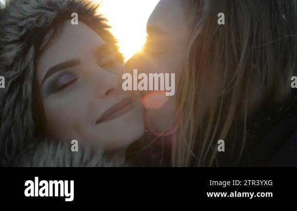 Cheek kissing women Stock Videos & Footage - HD and 4K Video Clips - Alamy