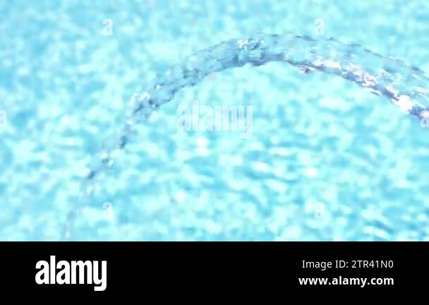 Pool Water Background Loop. 4k, close-up. water flows into the pool ...