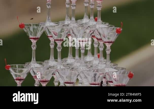 Pyramid of champagne glasses with liqueur Stock Video Footage - Alamy