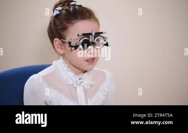 a portrait of a teenager who checks the eyes of an ophthalmologist, the ...
