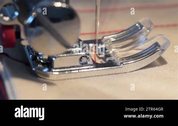 sewing machine close up. Sew Denim Macro. The needle of the sewing ...