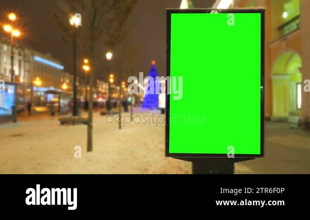 a Billboard With a Green Screen on a Busy Street Stock Video Footage ...