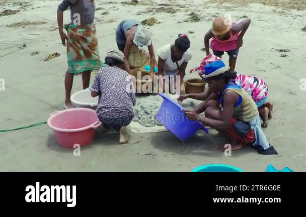 Native fishermen fishing on sea, using traditional technique pulling ...