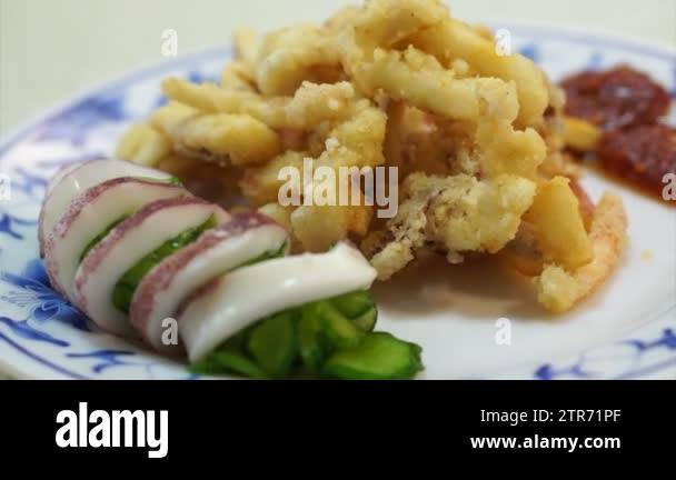 Taiwanese fried squid and cucumber stuffed steam cuttle fish local food ...