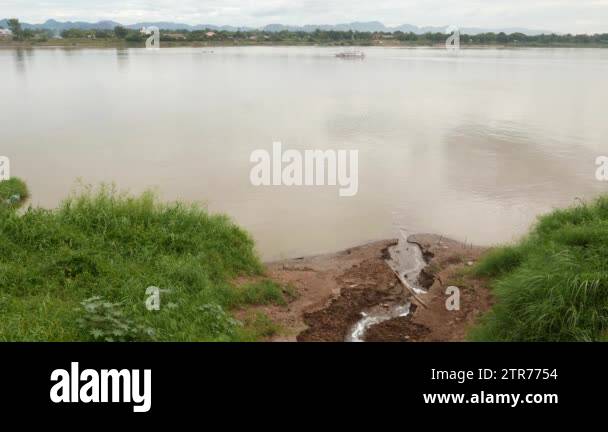 Sewage drains unthreated polluted waters into the Mekong River ...