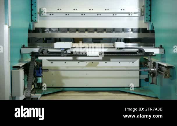 Hydraulic bending machine CNC. Back view. Move the various parts of the ...