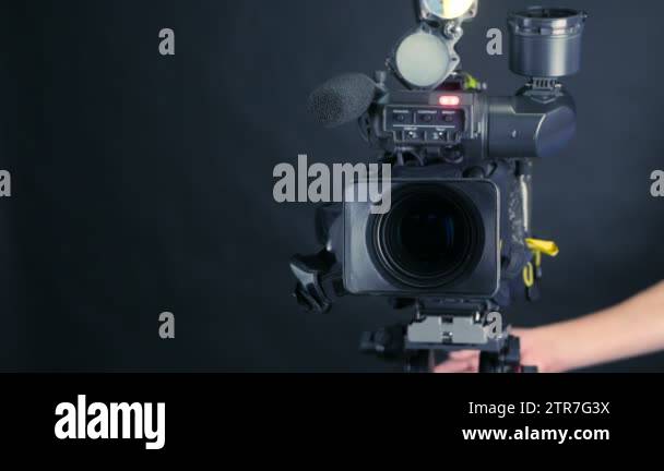 Camera operator working with a cinema broadcast camera at the ...