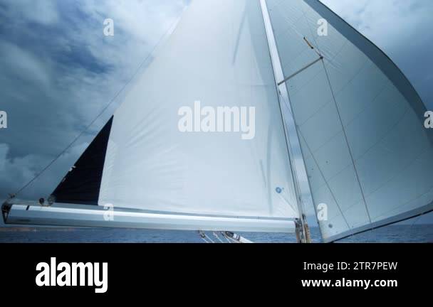 Sailing in the wind. Full sails, very strong wind. Ocean race, real ...