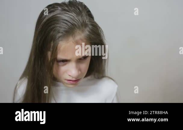little girl crying with tears rolling down her cheeks Stock Video ...