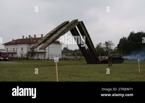 armoured vehicle-launched bridge, lowering the bridge to the ground ...