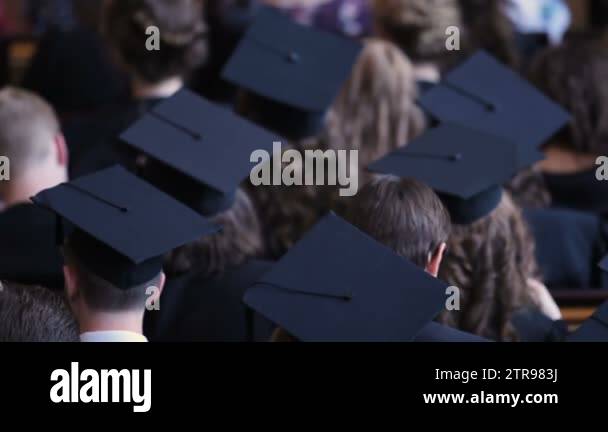 Successful people in mortarboards ready to receive higher education ...