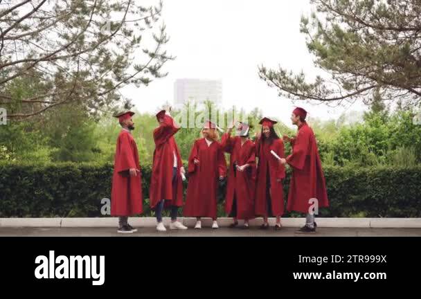 Careless graduating students are throwing mortarboards in air then ...