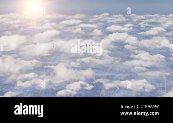 Flying above clouds aeroplane airplane sky stratosphere sun lens flare ...