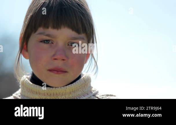 Boy shows emotion on camera,boy looks at the camera (emotion Stock ...