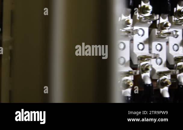 components of switchboard directing electricity to usage regions Stock ...
