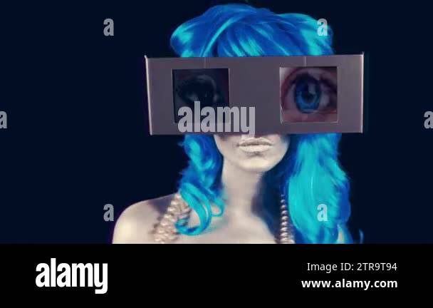 amazing woman with body painted silver dancing with 2 video screens as ...