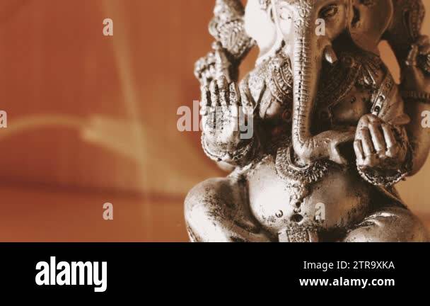 Lord Ganesha and Hinduism. Deity Ganesha with incense. Ganesha as a ...