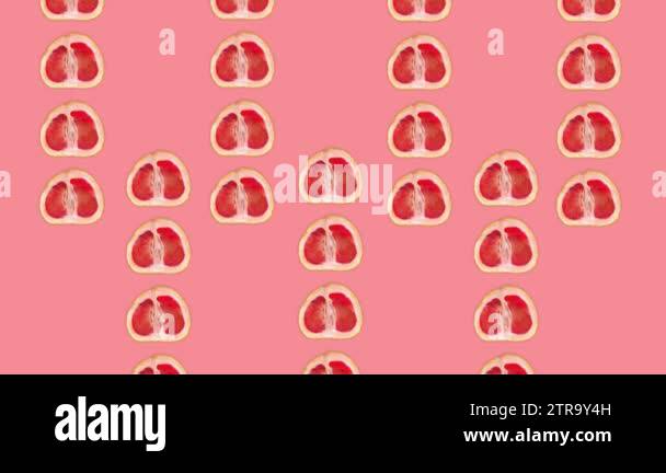 Grapefruit animation on pink background.Grapefruit halves are moving ...