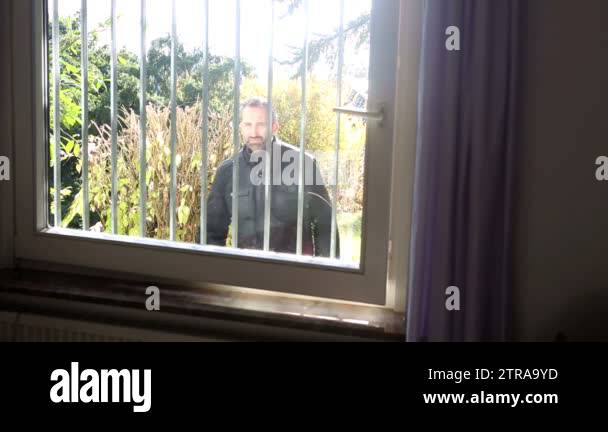 Window burglar bars Stock Videos & Footage - HD and 4K Video Clips - Alamy