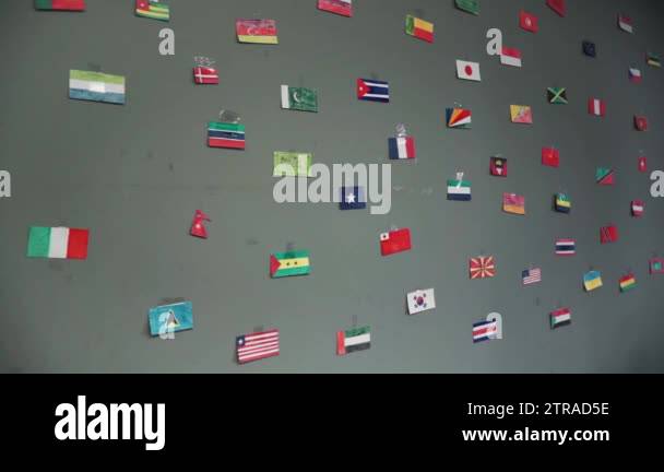 The flags of different countries drawn on a wall. Different flag icons ...