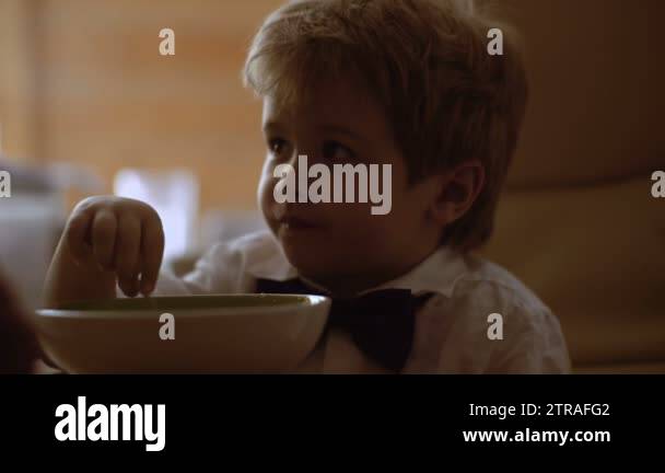 Kid eating oatmeal Stock Videos & Footage - HD and 4K Video Clips - Alamy