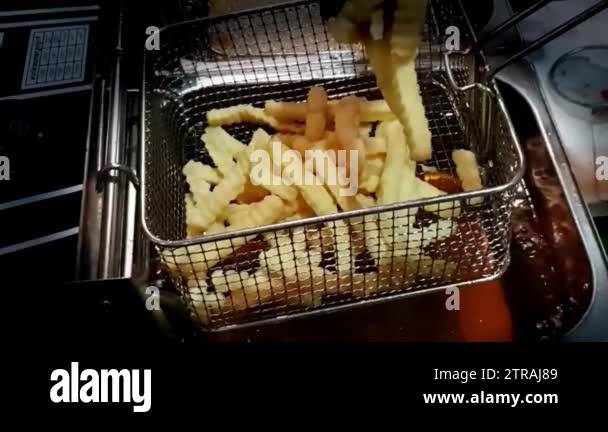 Chips fries deep fat fry Stock Videos & Footage - HD and 4K Video Clips ...