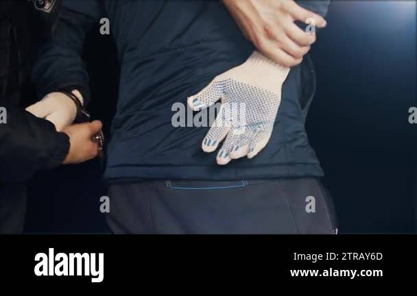 Arrest authority police officer criminal law handcuffs standing Stock ...